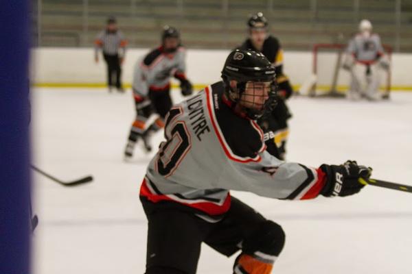 Macintyre Hits the Century Mark