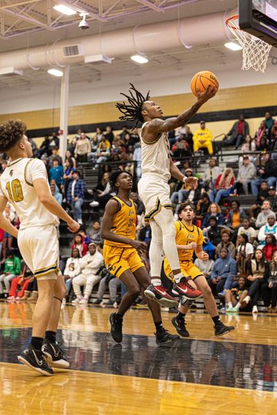 Trojan Basketball standout reaches career milestone