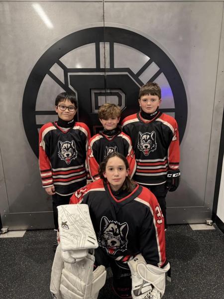 Members of Wolves U10 Skate at TD Garden