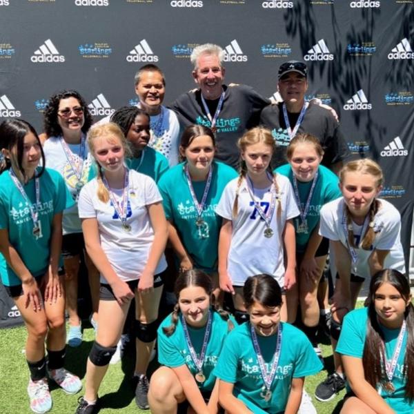 Local doctor creates community for Ukrainian girls through volleyball