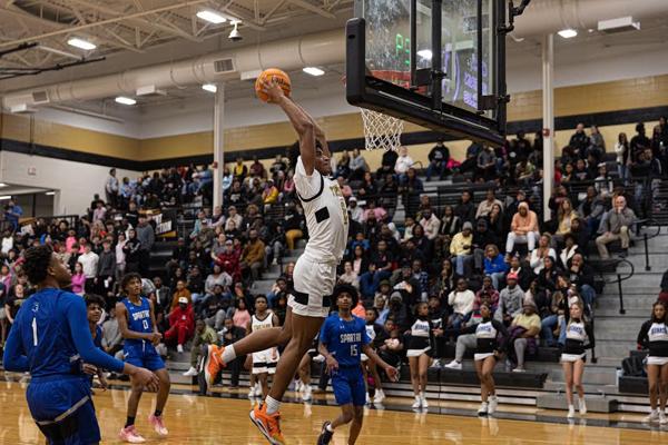 TROJAN BASKETBALL TAKES TWO FROM THE SPARTANS