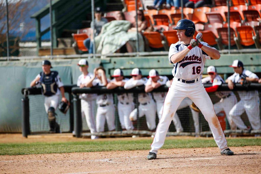 Reps split doubleheader to open season