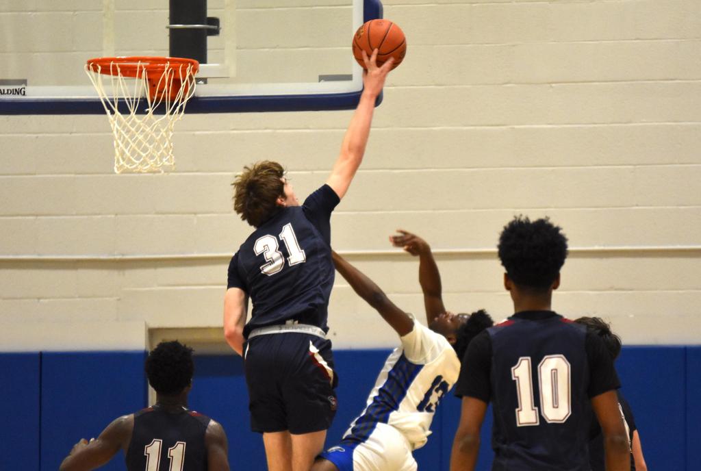 BOYS BASKETBALL: O'Hara's Pearse McGuinn Following a Path Less Traveled