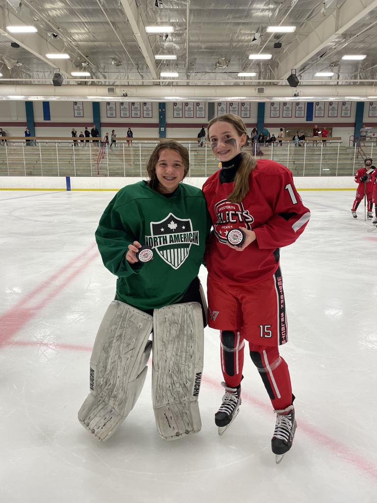 Players of the Game Ainsley Adams (L) of North America and Isabel Power ...