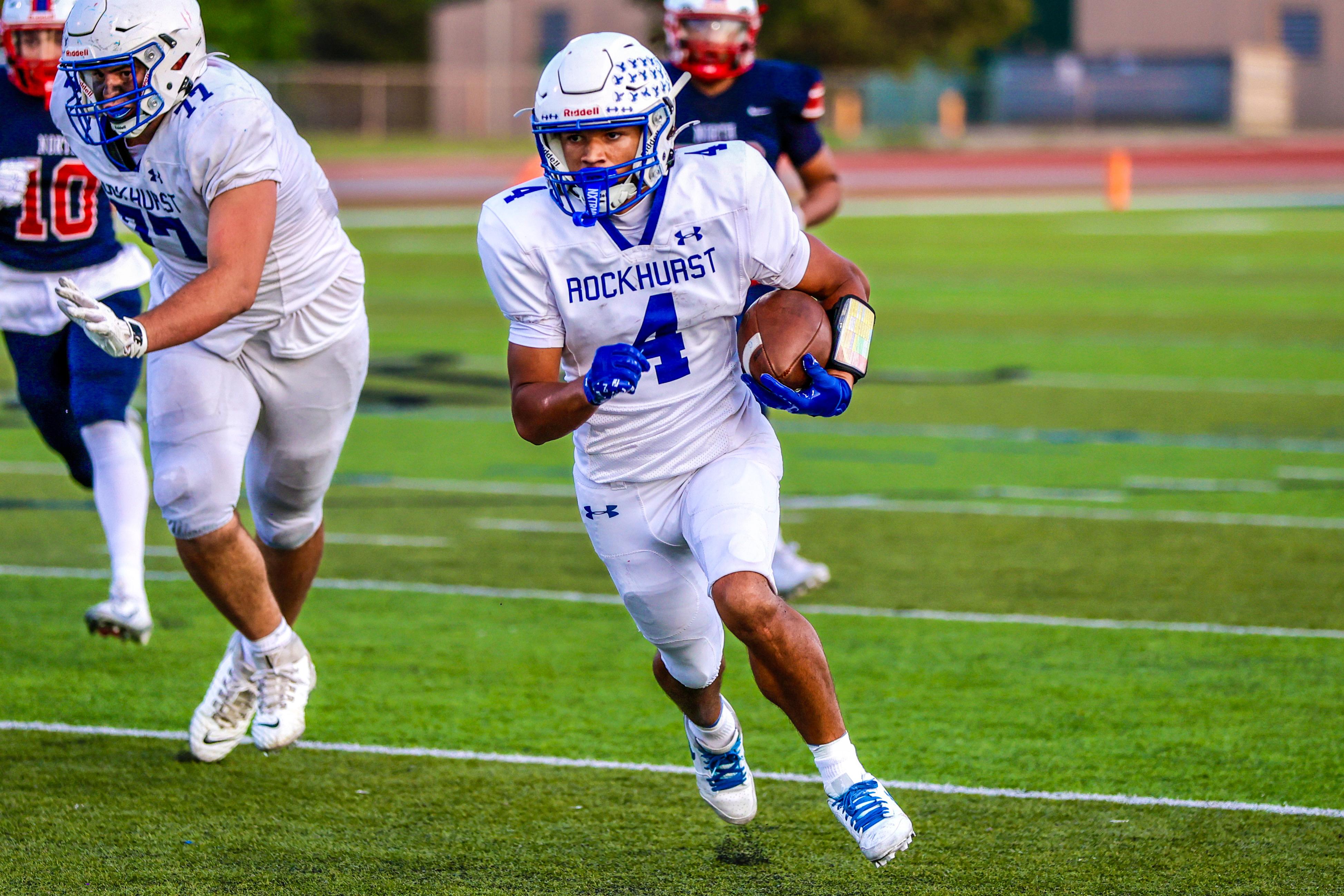 Rock rolls past Olathe North, 35-14