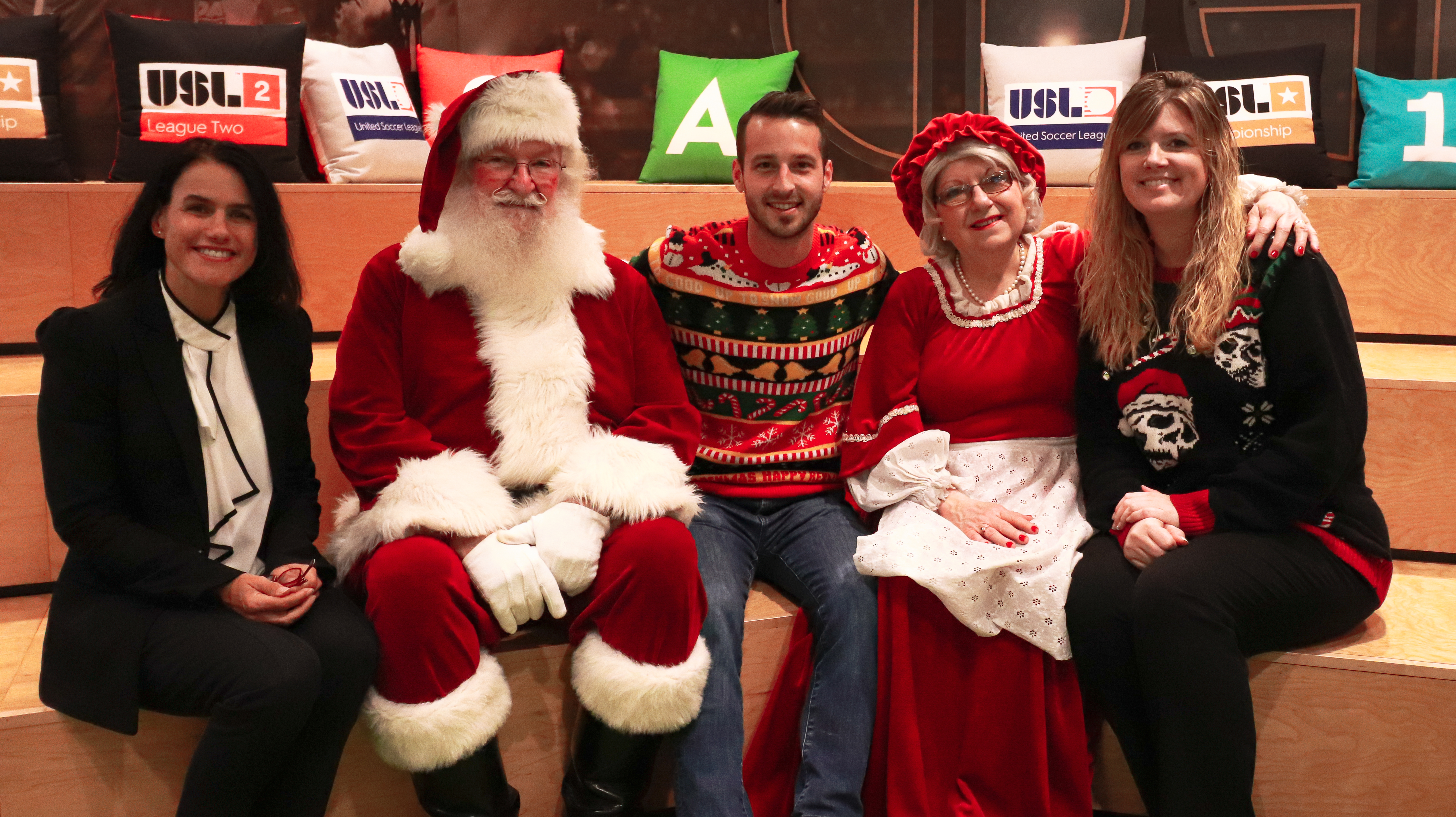 Santa and Mrs. Claus visit USL Headquarters