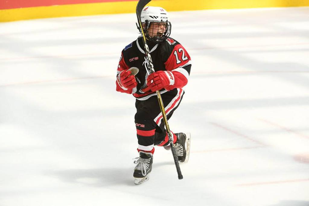 Team Brick Alberta's Brett Olson reacts after scoring the overtime game ...